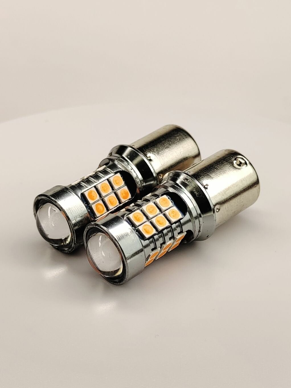 Яркие LED лампы с линзой 12V желтые P21W (BA15S 1156) чипы 3030 27SMD, для легковых автомобилей, спецтехники, мотоциклов, квадроциклов, американских тягачей, 2шт