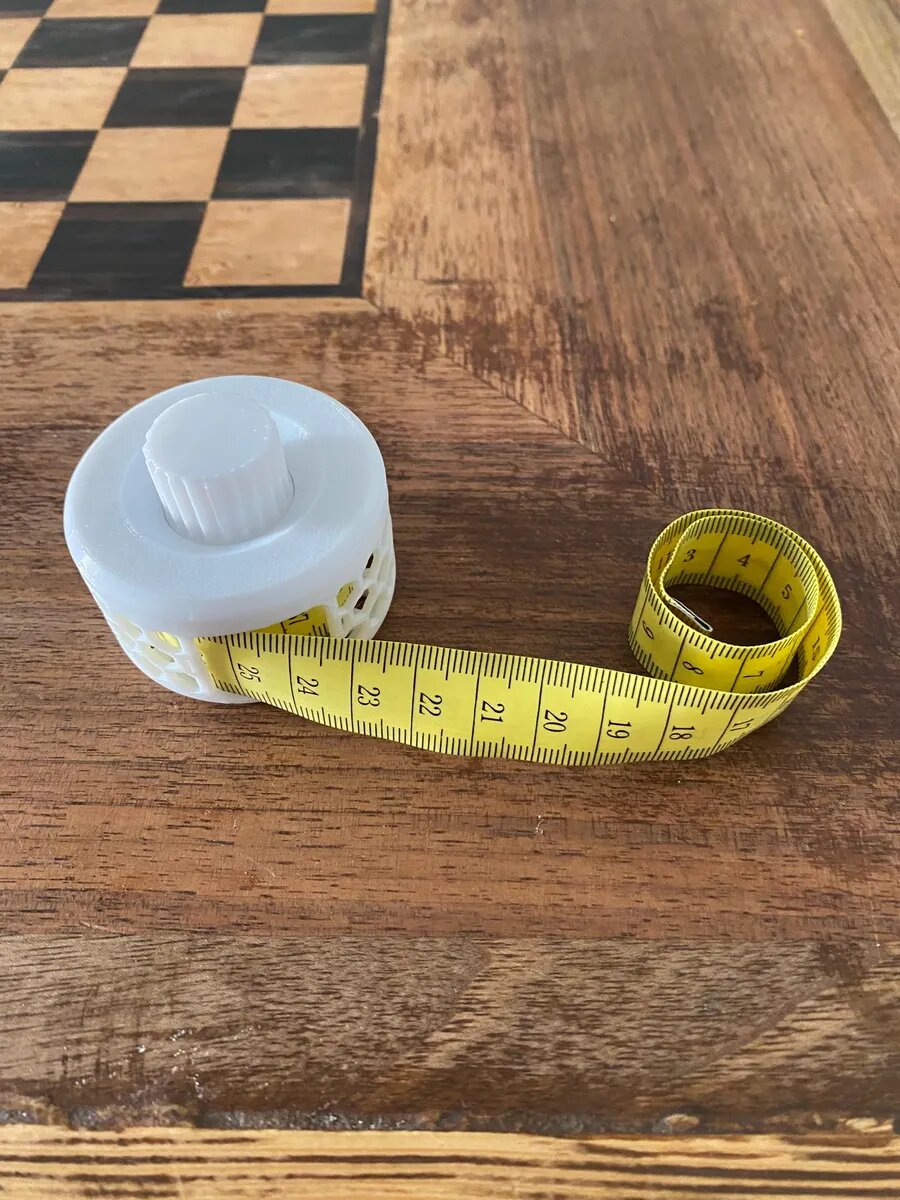 Контейнер для измерительных лент