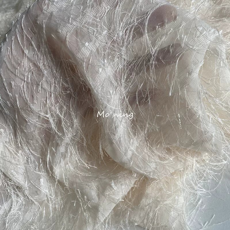 Материал для детской одежды: легкий, полупрозрачный шифон с мерцающими диагональными полосами и блестящими кисточками,