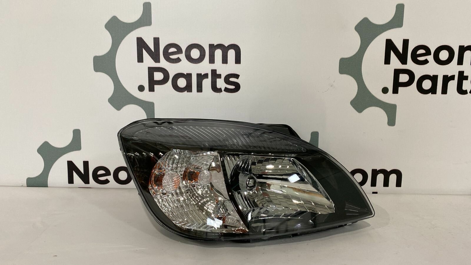 Фара правая для Kia Rio 2 JB 2009-2011, Neom.Parts, 921021G620