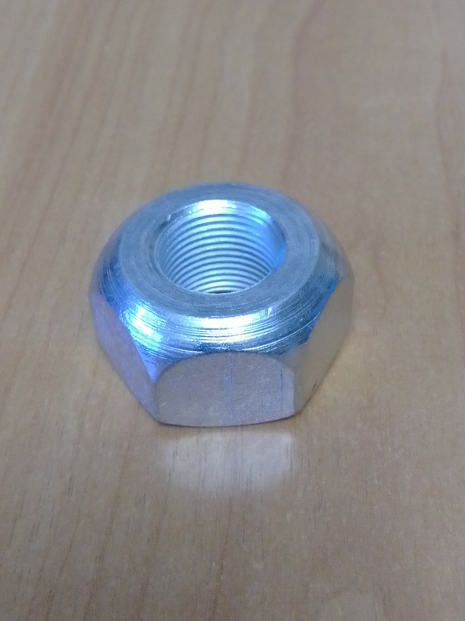 Гайка колеса М20х1.5 для автомобилей ЗИЛ-130, ГАЗ-53, ГАЗ-3307, урал передняя левая резьба . ОАО ГАЗ