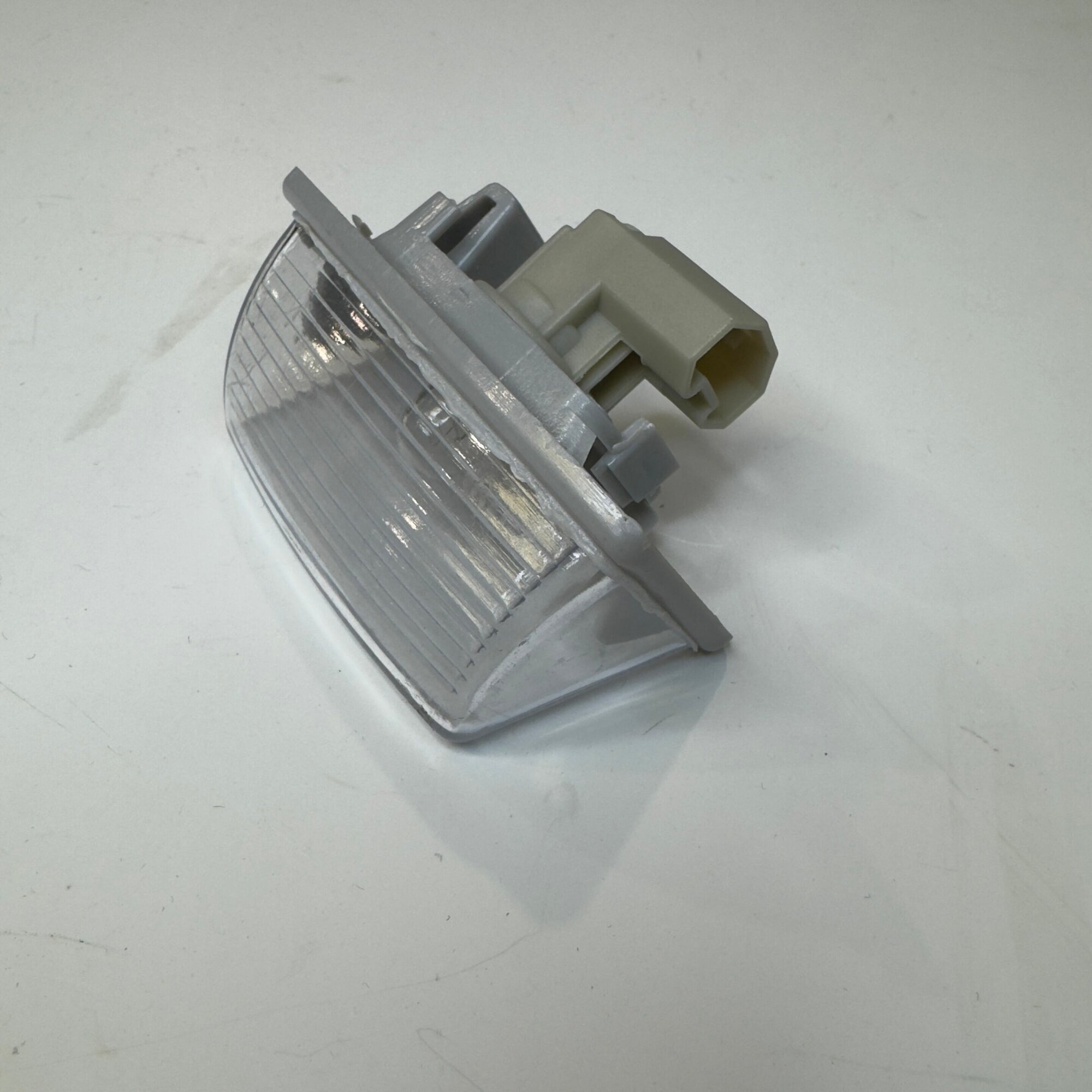 Фонарь номерного знака левый Lifan Solano (620) [1.6 16V 5MT седан] B4108100