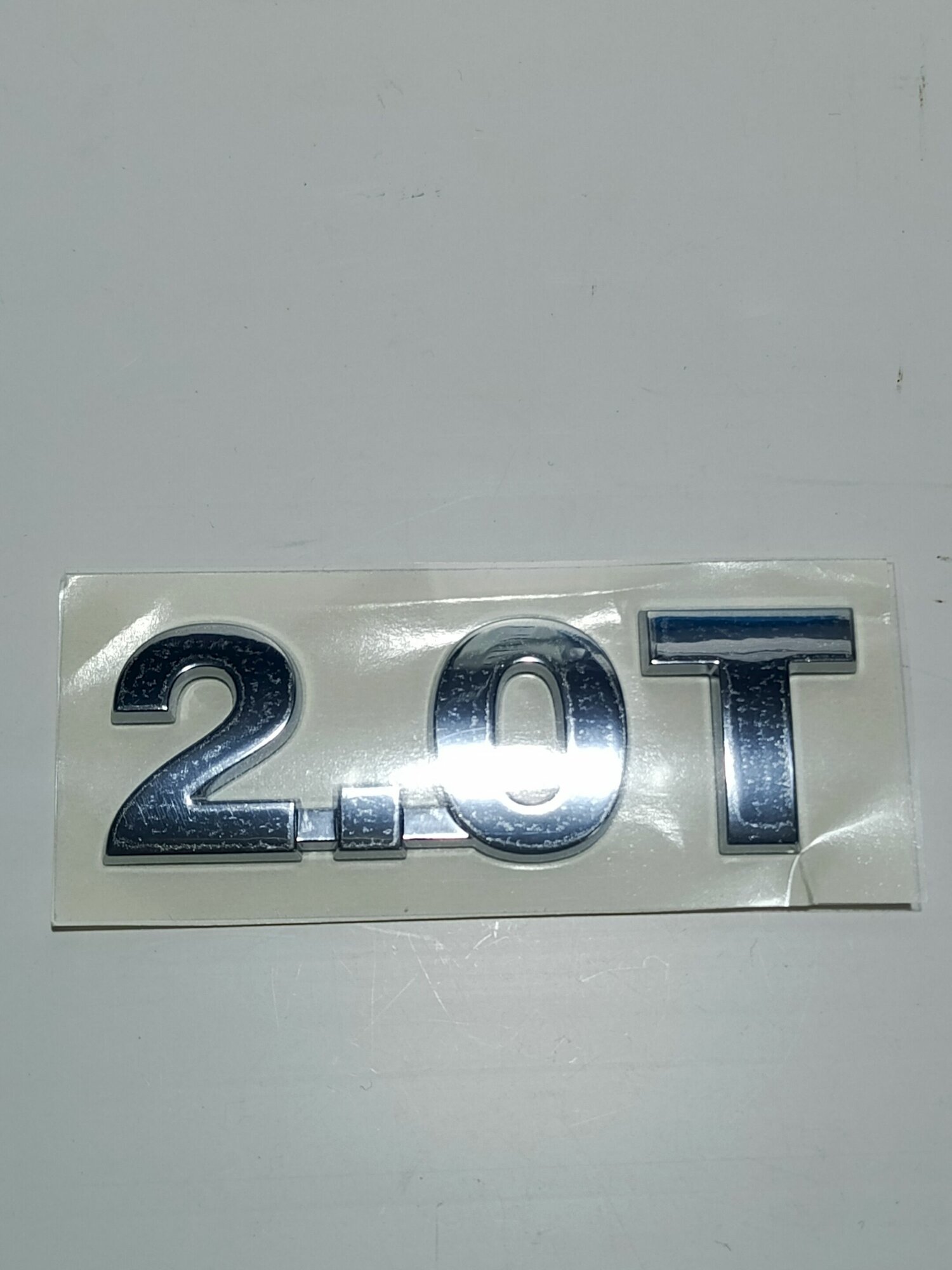 Эмблема "2,0T" JAC T6 [2.0 16V 6MT пикап 4X4 Turbo дизель] 3904250U1140