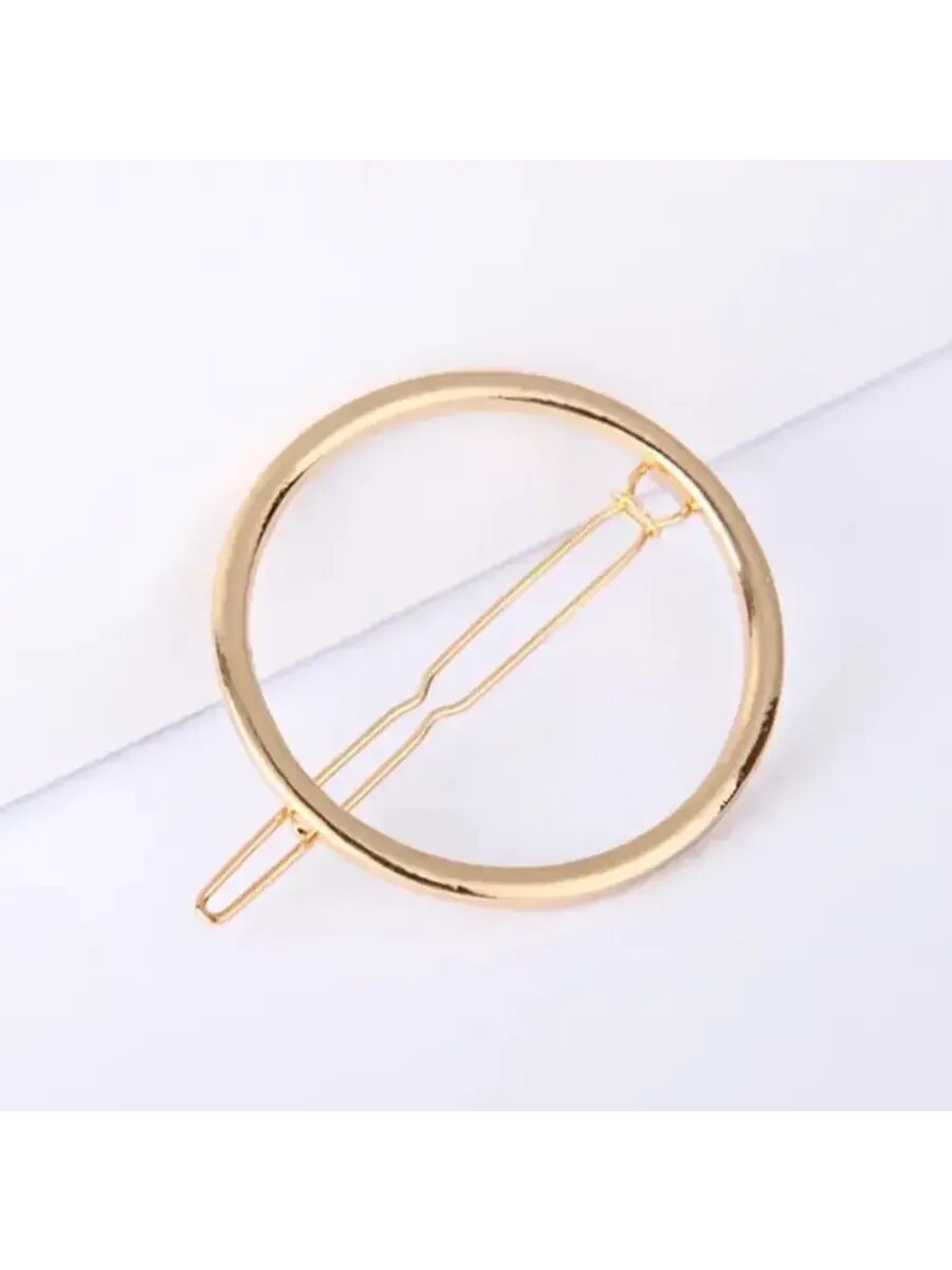 Стильная золотая заколка для волос