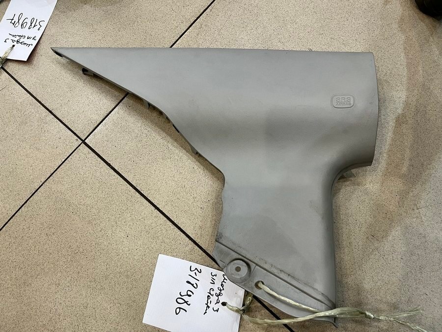 Обшивка стойки задняя левая (внутри) от Mazda 3 bk 2003-2009