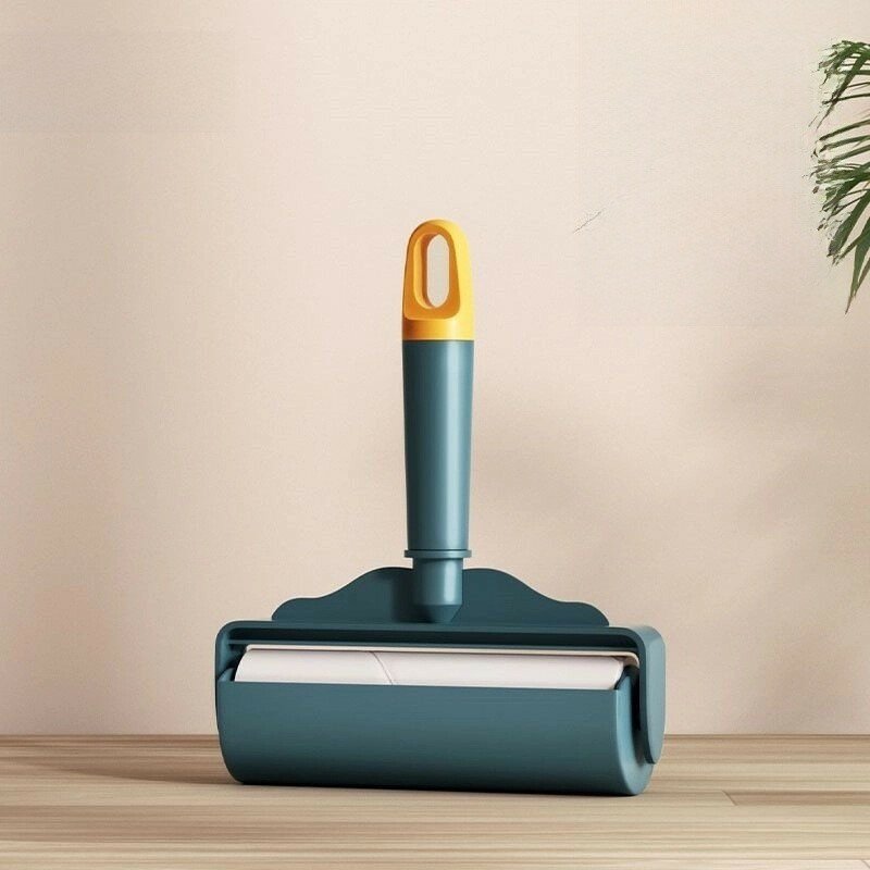Compact sticky lint roller with tearing sheets for pet hair and dust removal on clothes and bedding brand unspecified green
