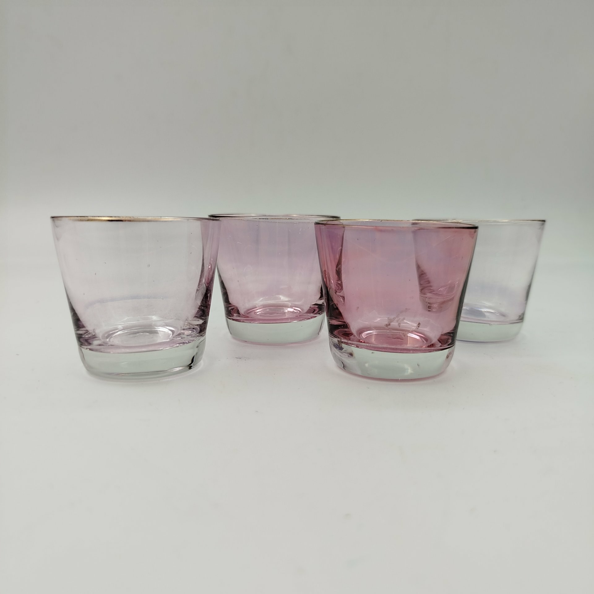 Набор из 4-х стопок розового оттенка, стекло, золочение, СССР, 1970-1990 гг.