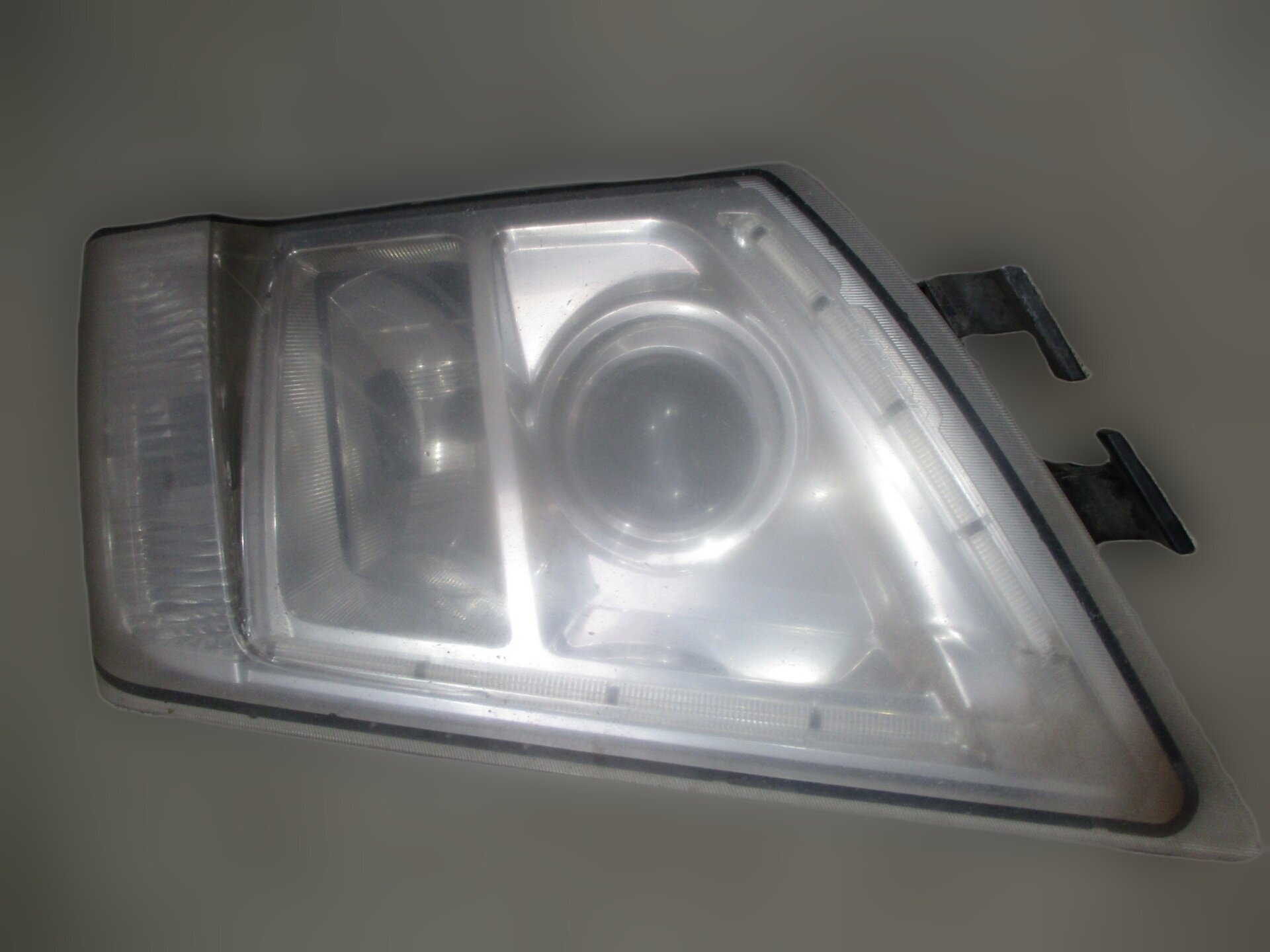 Фара основная левая HELLA Volvo FH, FM