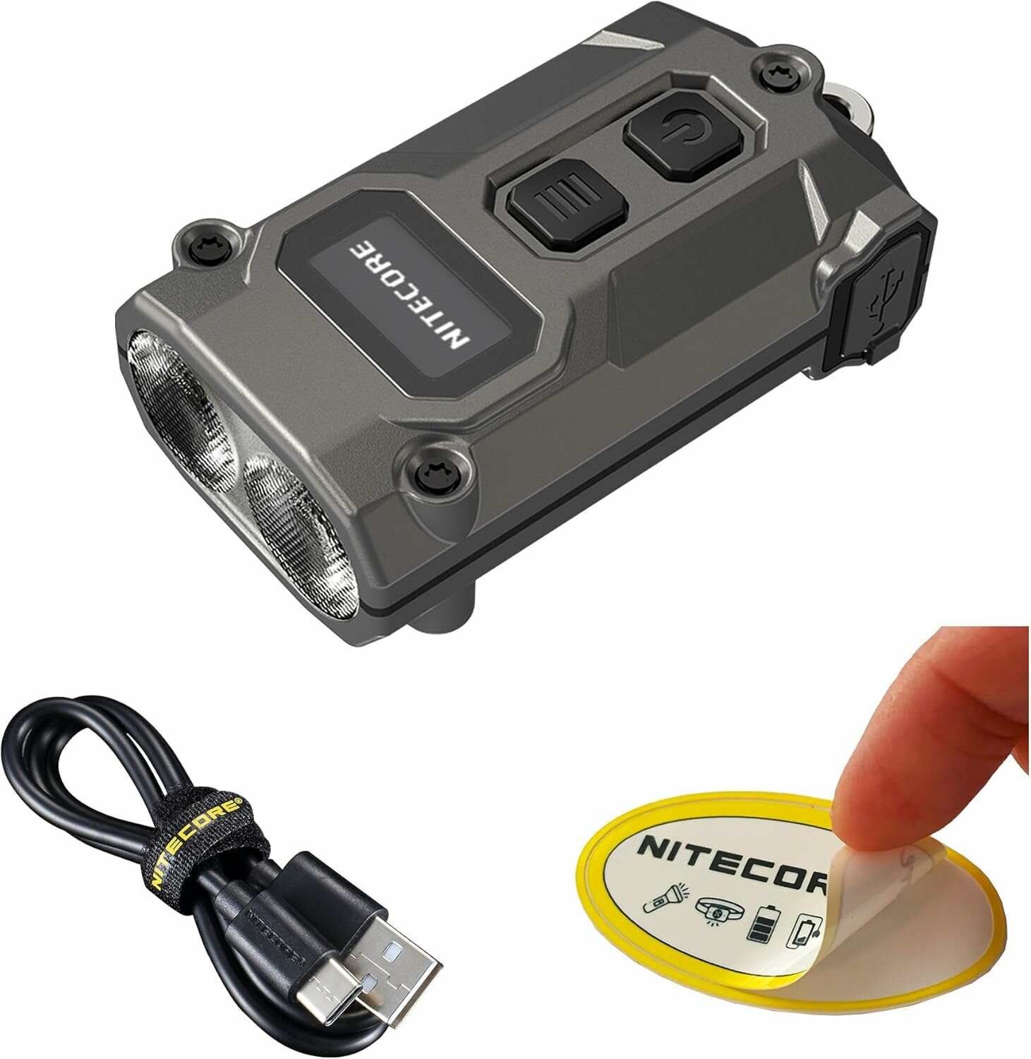 Фонарик-брелок Nitecore TINI 3, 600 люмен, перезаряжаемый через USB-C, легкий, с несколькими режимами цветовой температуры (теплый, нейтральный белый, холодный белый) и наклейкой NSticker (черный).