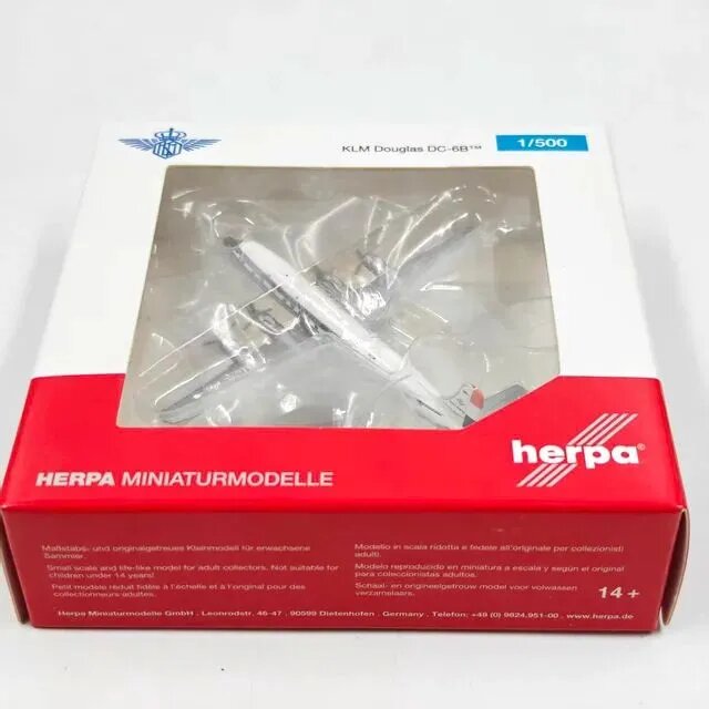 Литая модель самолета Herpa DC-6B в масштабе 1:500, артикул 536998, из сплава.