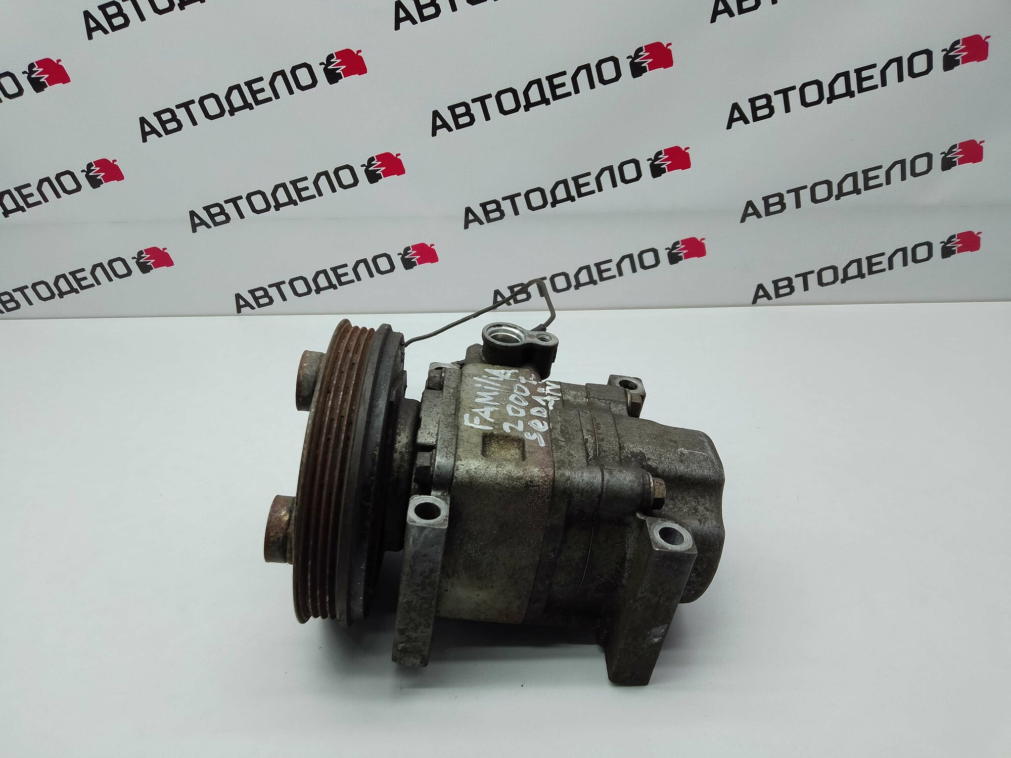 Компрессор кондиционера Mazda Familia BJ 2000 г