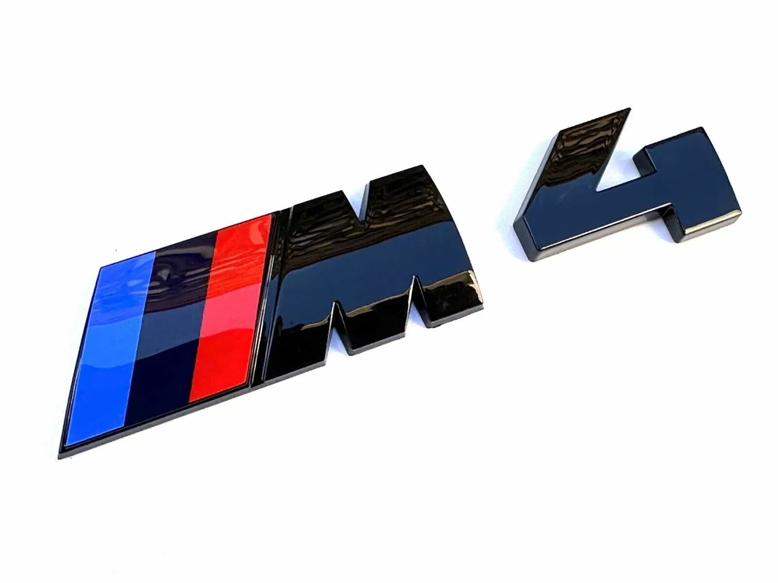 Эмблема BMW M4