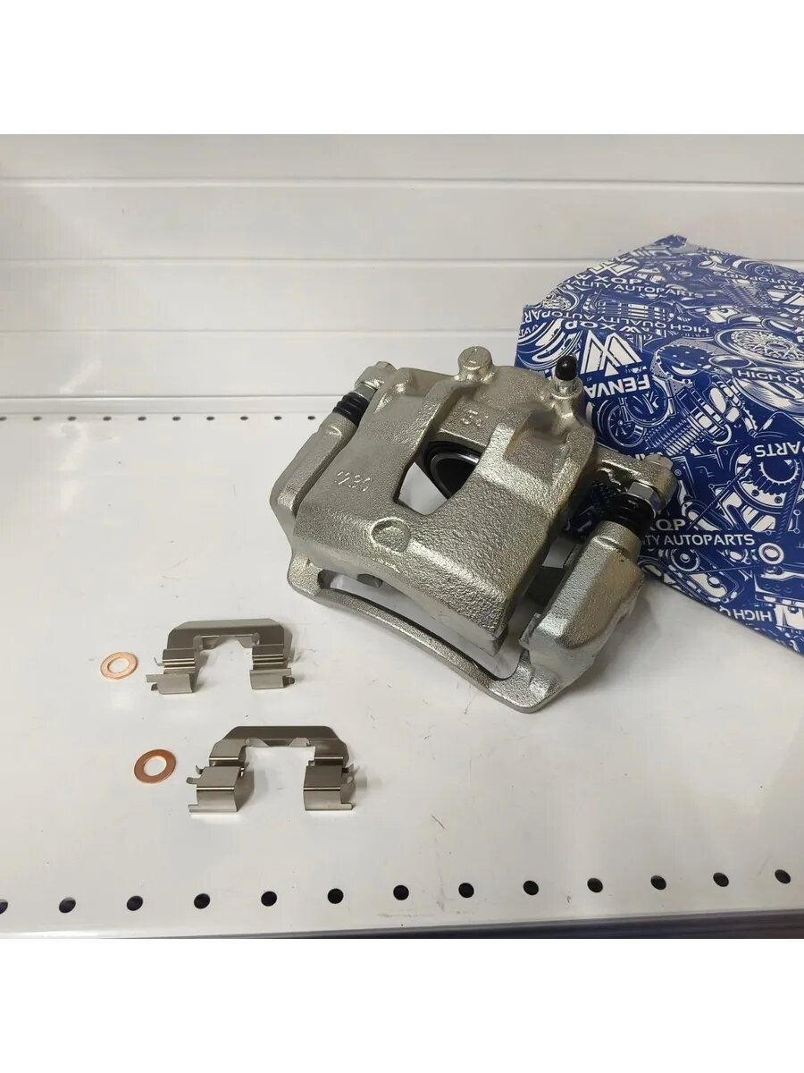 Суппорт левый в сборе на Hyundai/Kia