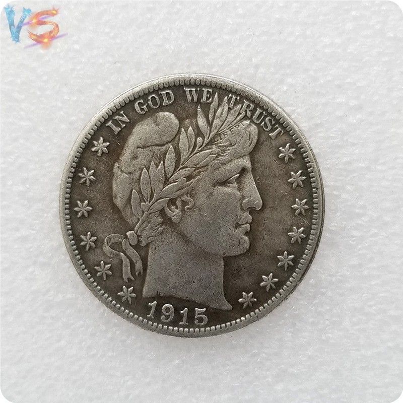 Это серебряная монета из серии Серебряный доллар США Барбера 1915 года.
