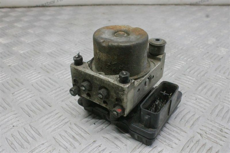 Б/У Блок ABS (насос) Mazda Demio 1 DW3W / Мазда Демио 1 DW3W 1.3 B3 85Л.С. 2003