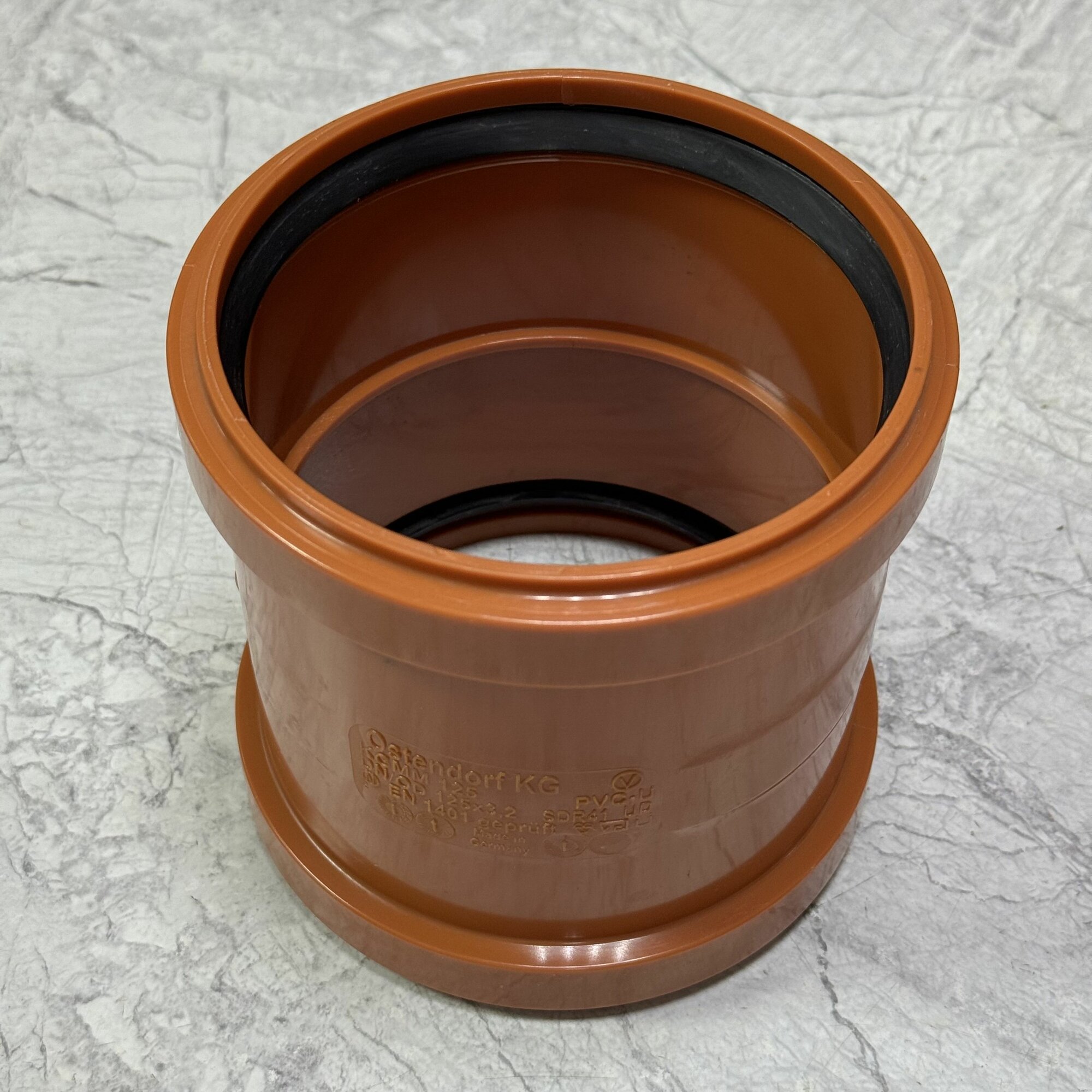 Муфта двойная двухраструбная 125 рыжая Ostendorf для наружной канализации (с ограничителем внутри)