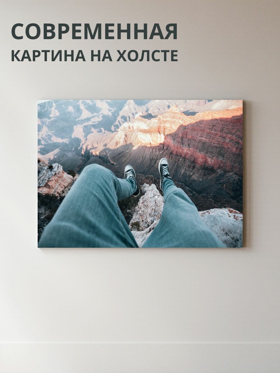 Картина на холсте Человек над каньоном 70x50 см