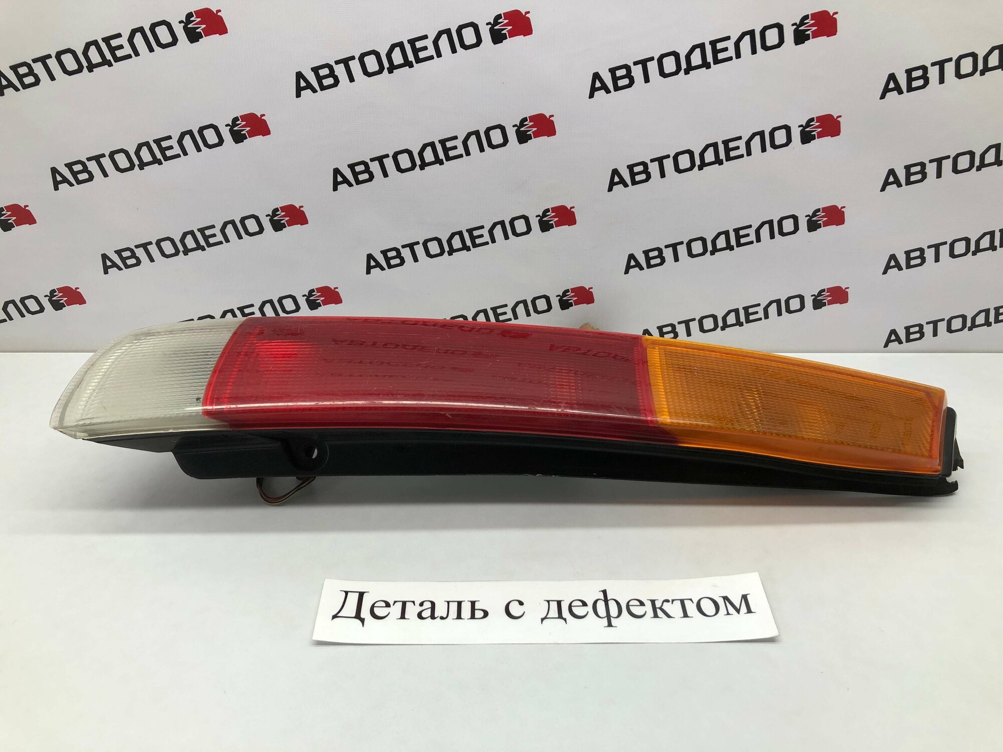 Фонарь задний левый Toyota Sprinter Carib AE115G
