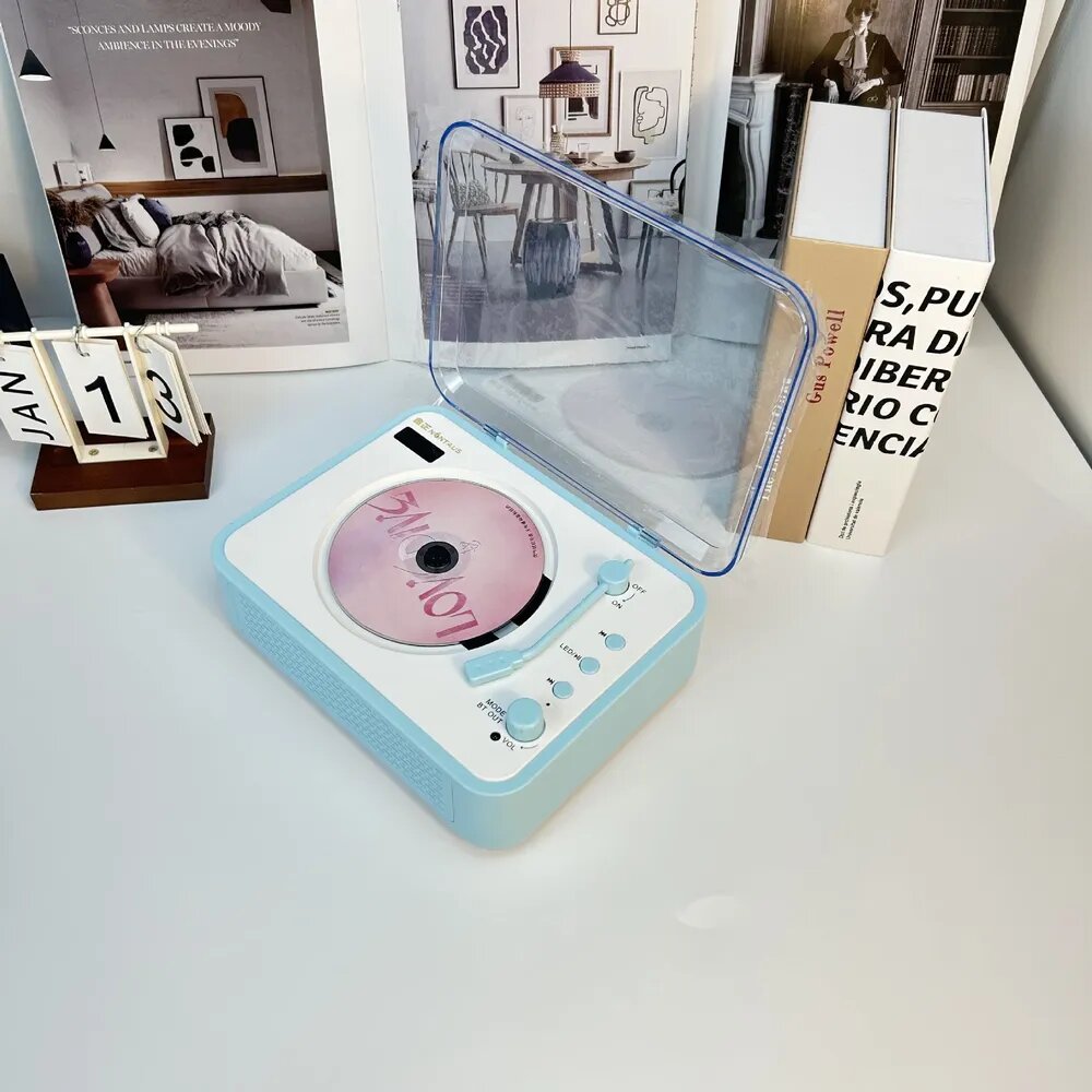 Портативный CD-плеер с верхней загрузкой и Bluetooth, голубой, для дома и путешествий. Компактный дизайн, стильный внешний вид.