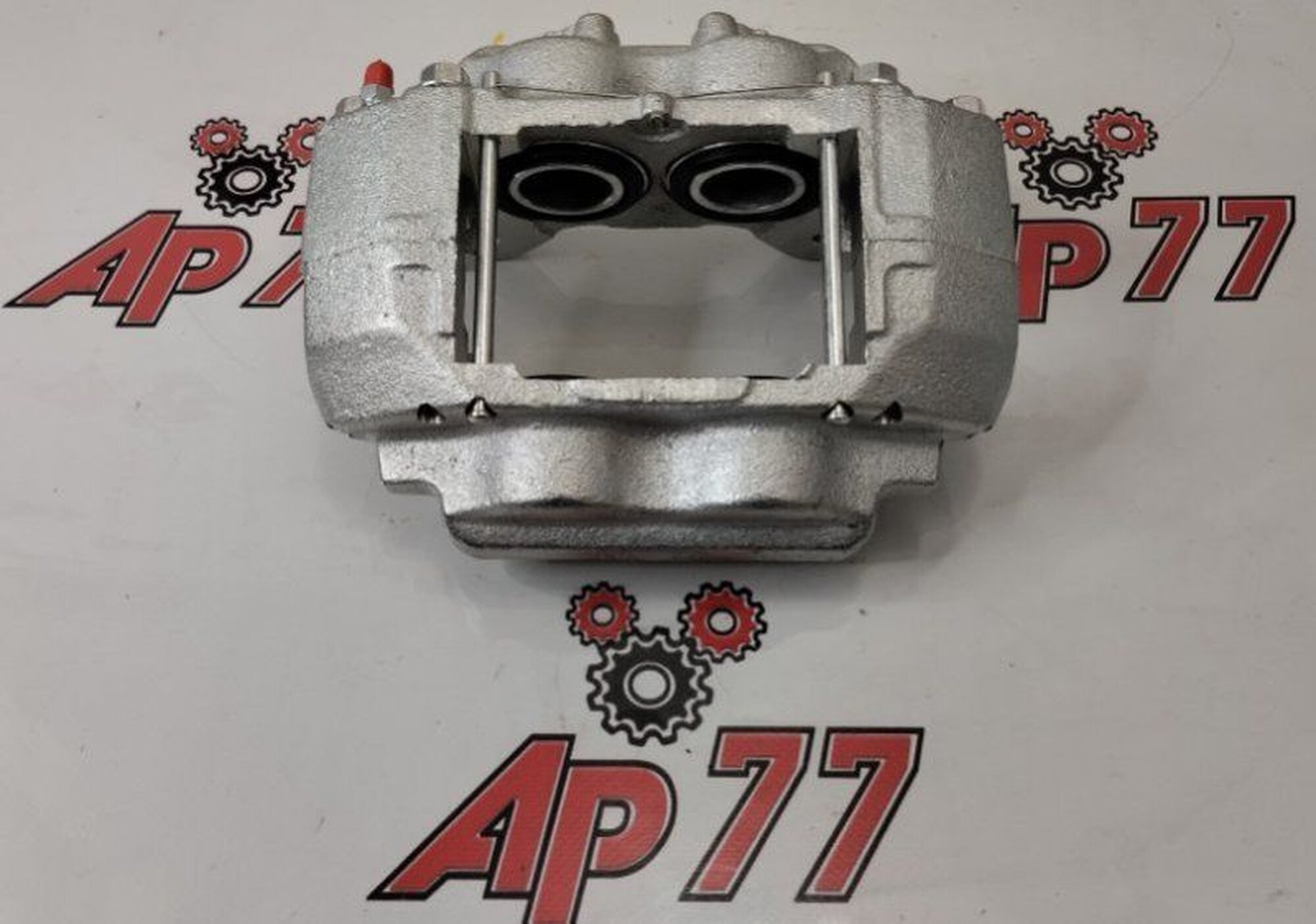 Суппорт Toyota Land Cruiser FZJ100 FL 4775060080 передний левый