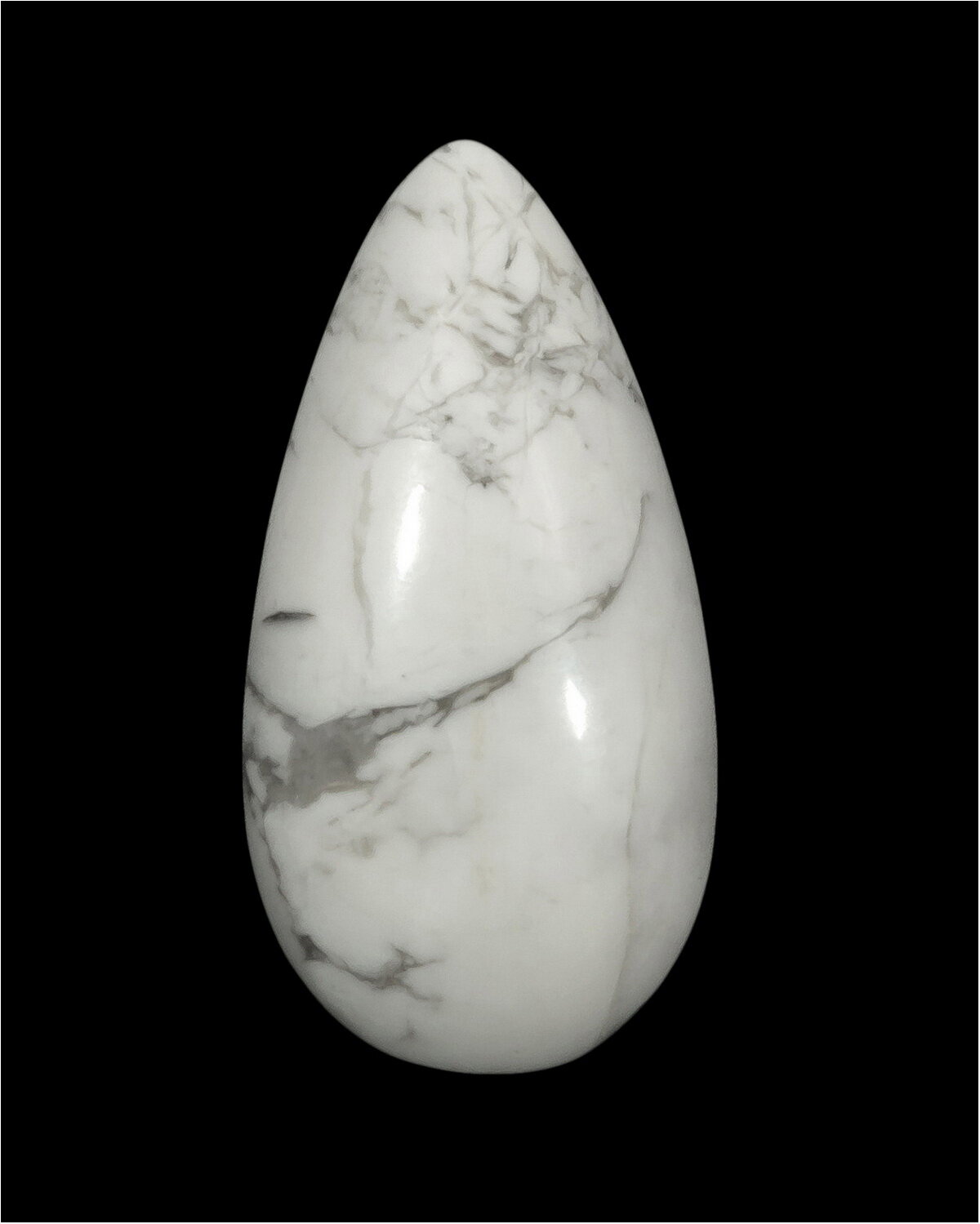 Магнезит, кабошон из минерала, размер: 39х19х7 мм, натуральный камень.