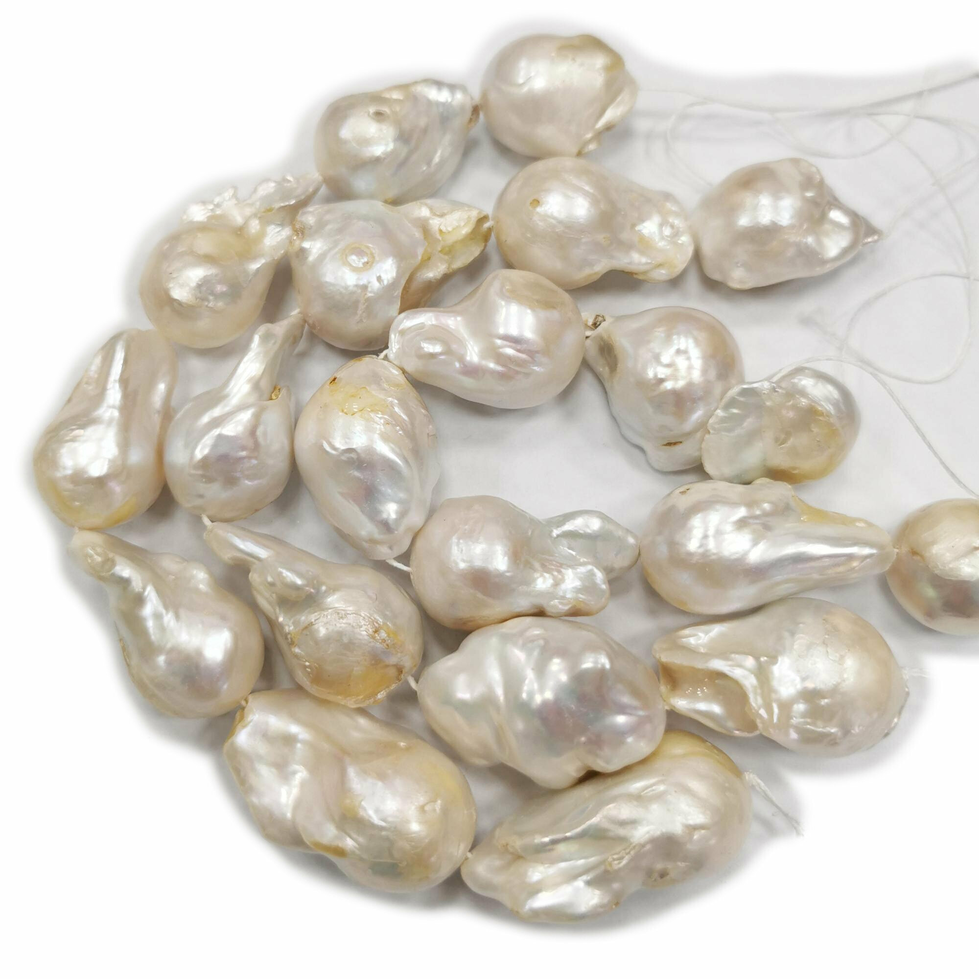 Бусина из жемчуга 17-35мм, Кеши, неправильной каплевидной формы, сорт 2, белый с золотисто-лиловым отливом, 7 шт, низка