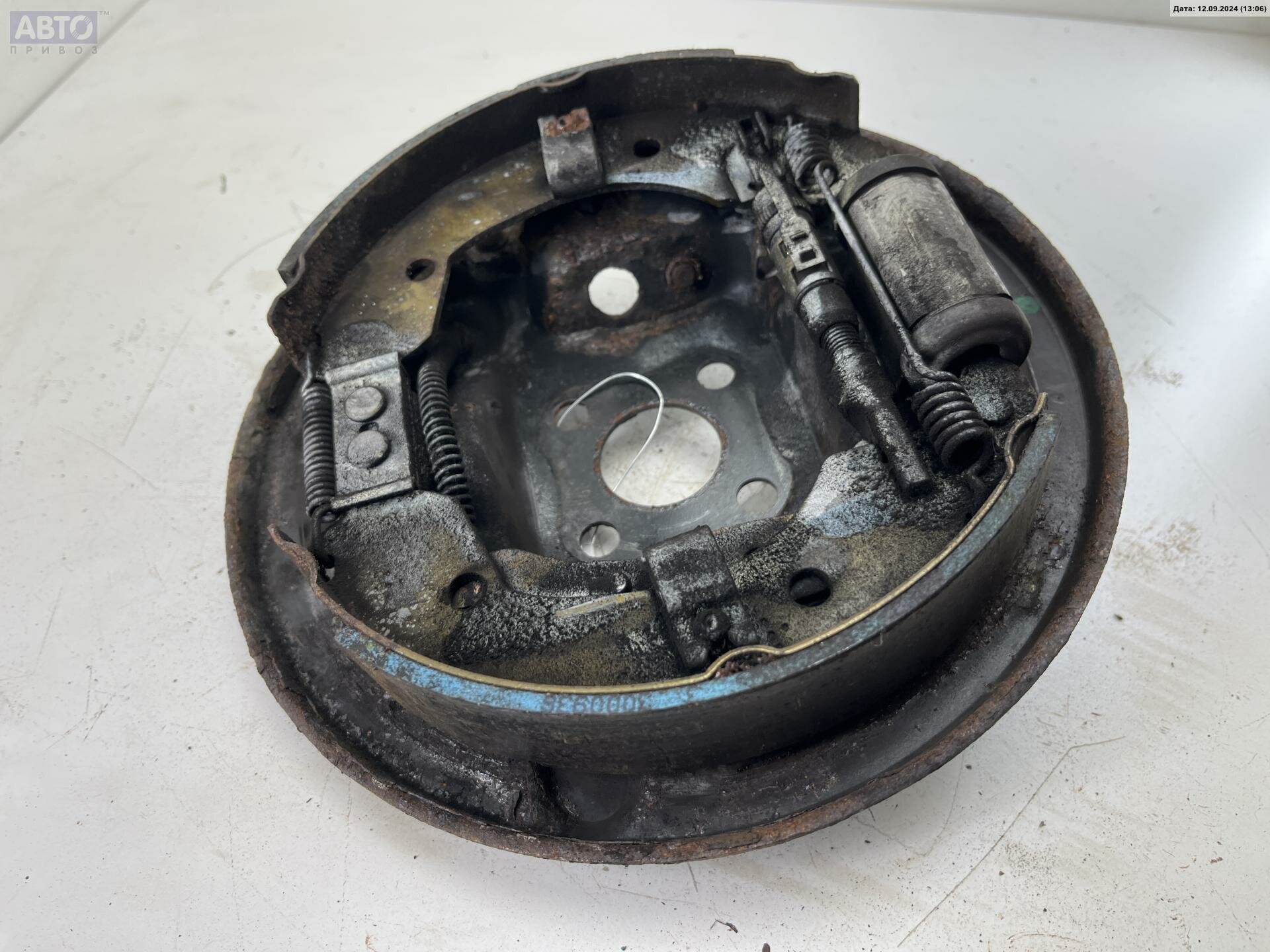 Щиток (диск) опорный тормозной задний левый Nissan Micra K12 (2003-2010)