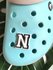 Джибитс буква N на Crocs