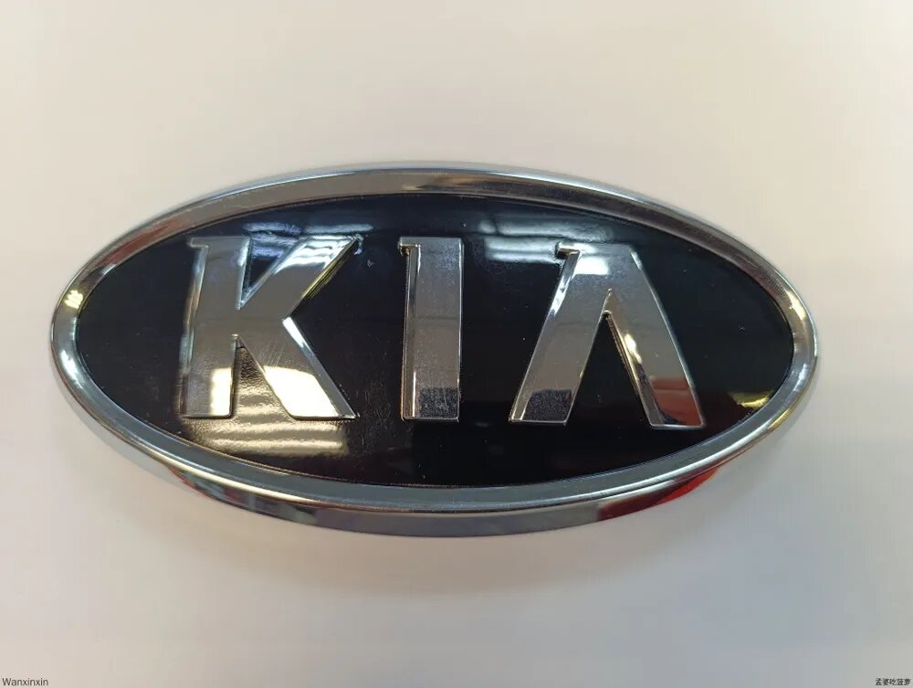 Передняя эмблема Kia Sportage 3 (2010-2016) для решетки радиатора, размер 170x85 мм, пластик