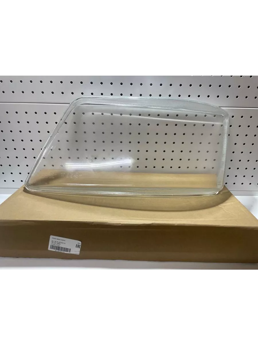 Стекло фары левой MAN TGA/TGL/TGM/TGS/TGX BM08A001500 (TangDe)
