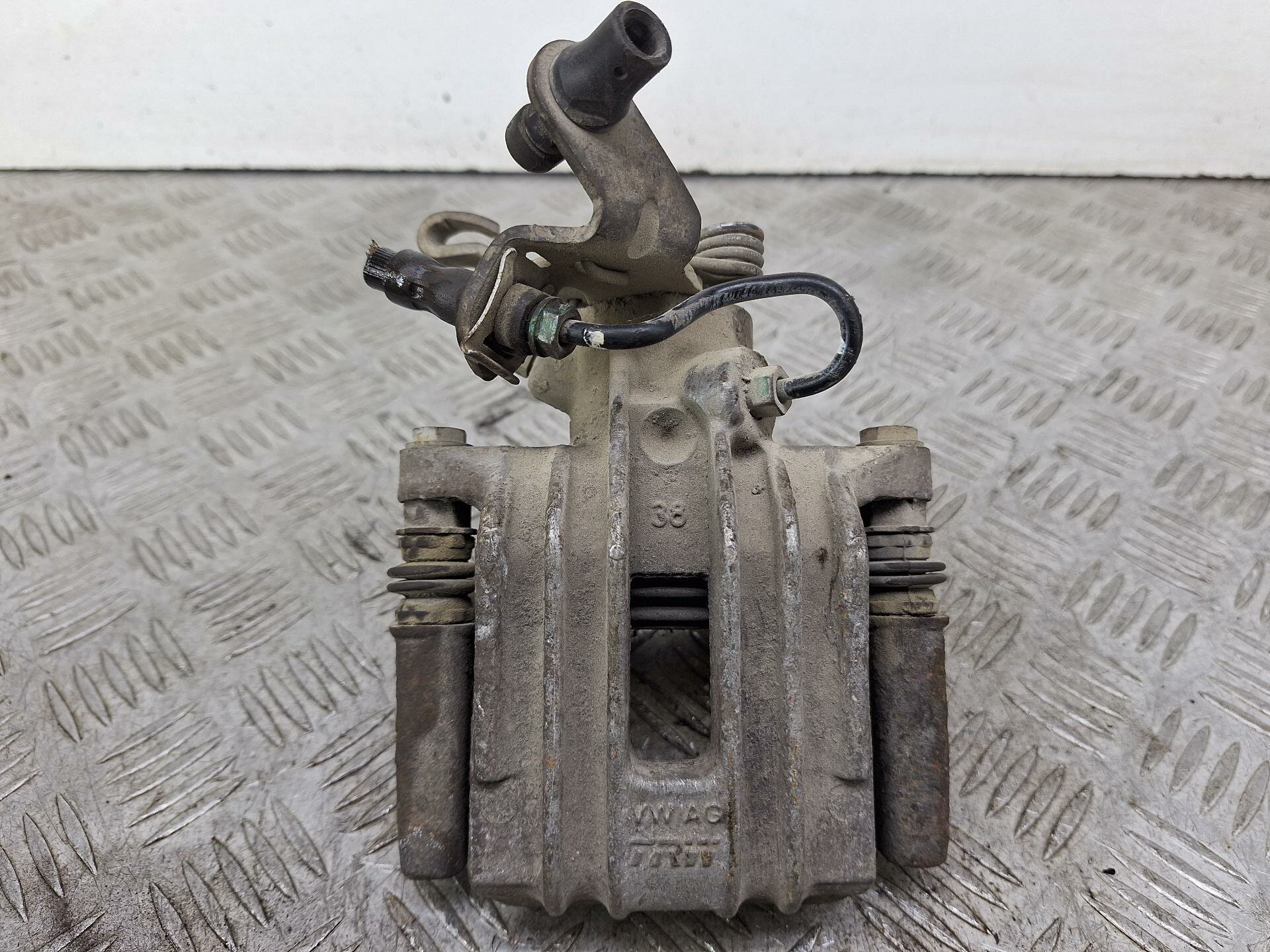 Суппорт тормозной задний правый Audi A3 8P рест. 2005