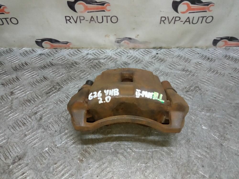 Суппорт передний левый Mazda 626 GW 1997-2002 Mazda