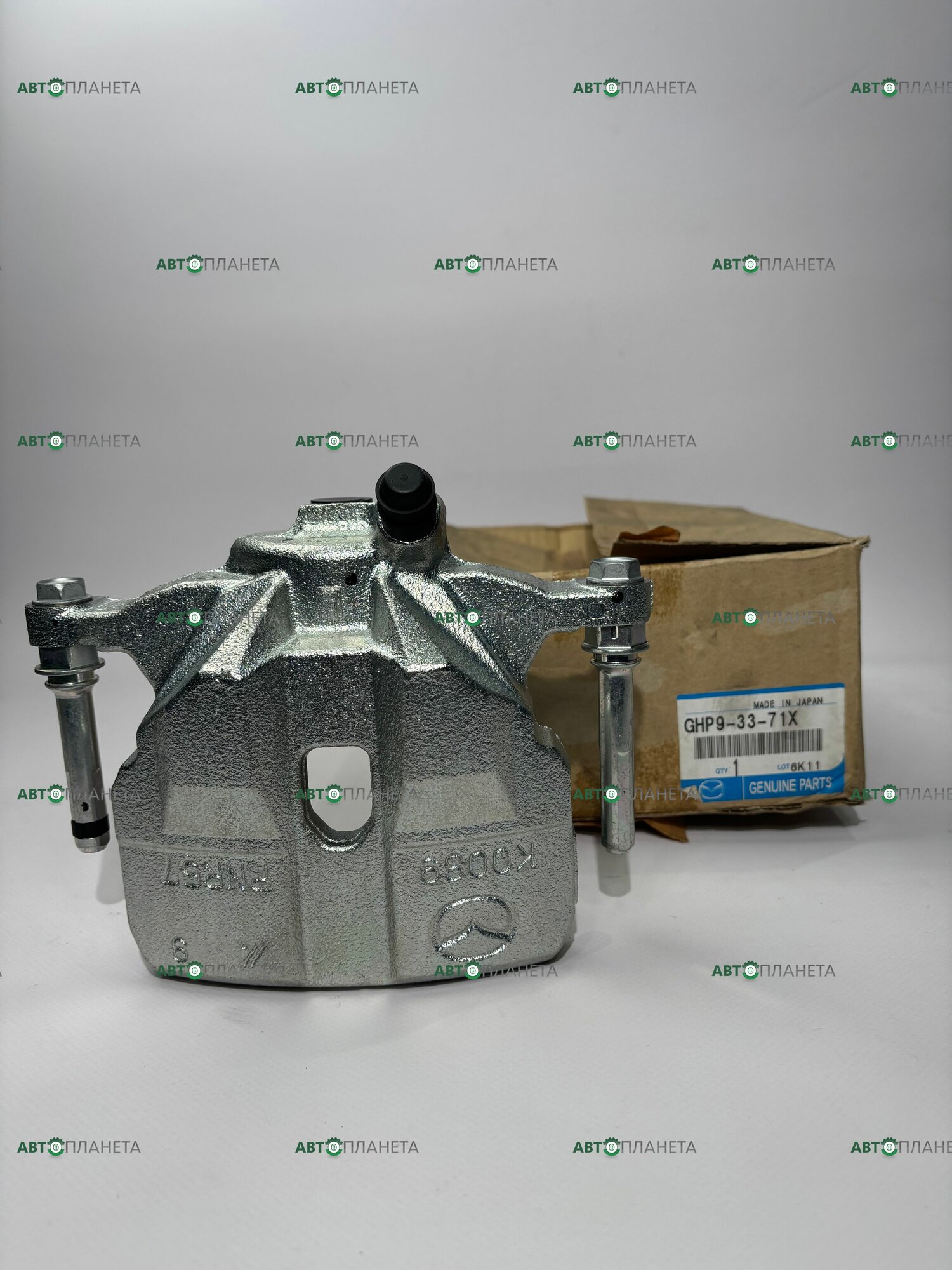 Тормозной суппорт передний левый Оригинал Mazda GHP93371X