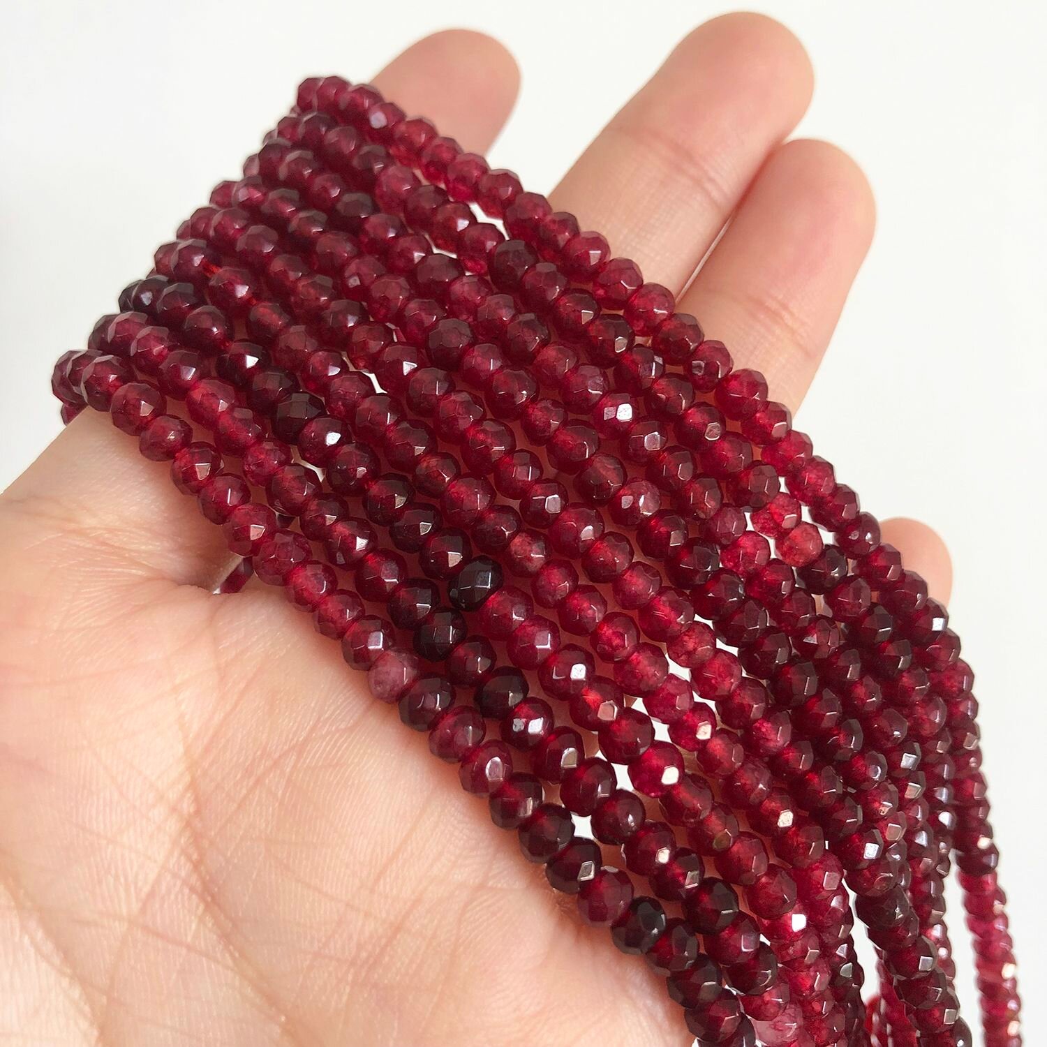 Бусы из камня рубин 3х4мм граненые бусины рондель 37см