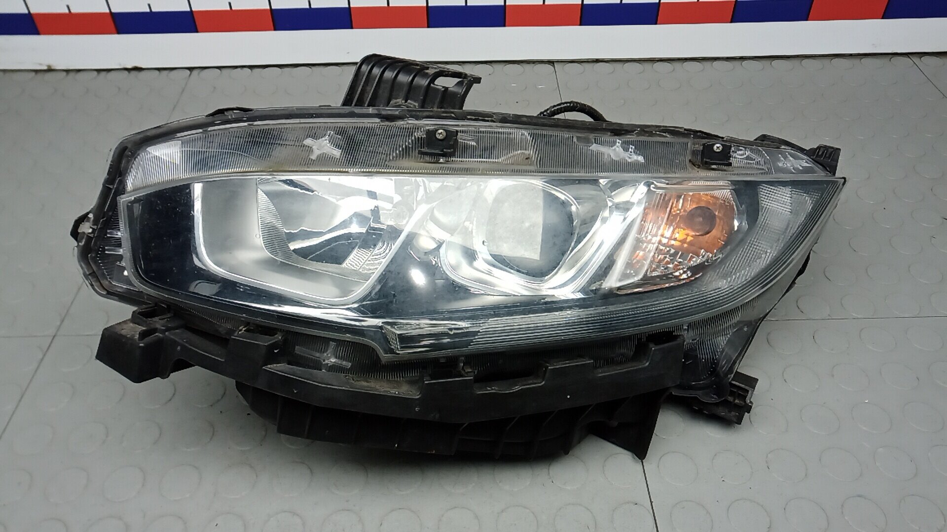 Фара левая HONDA CIVIC 10