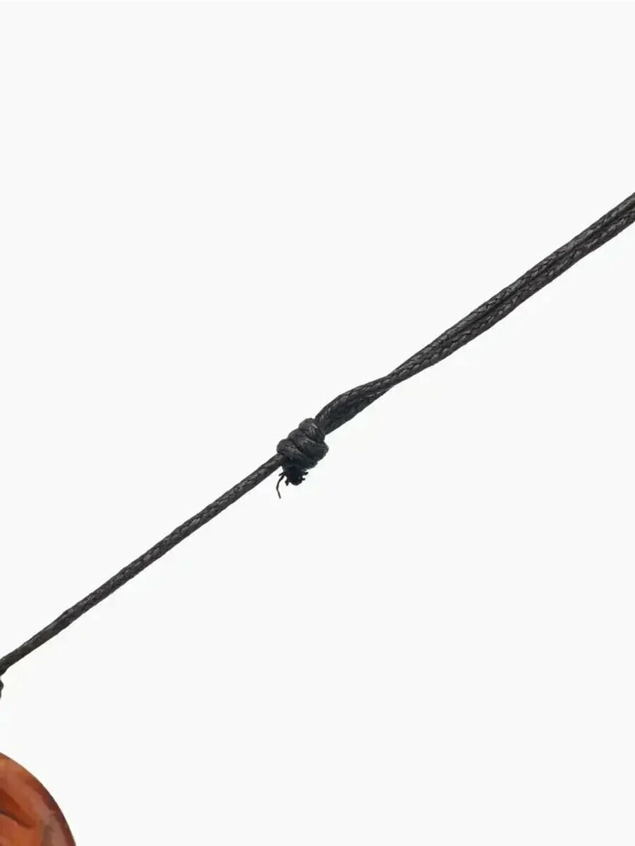 Деревянное украшение с изящной спиралью