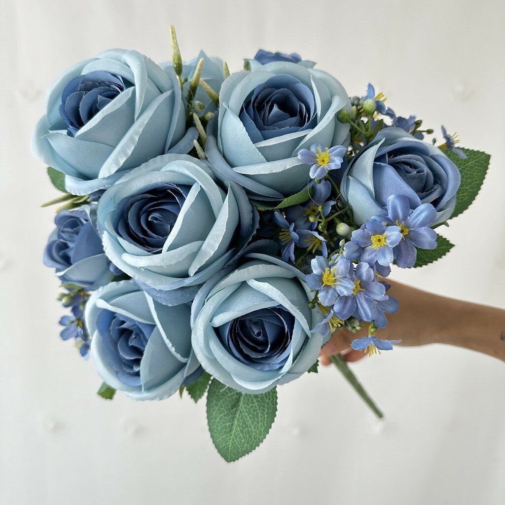 Romantic silk rose display with multiple colors for celebrations and home interior styling blue