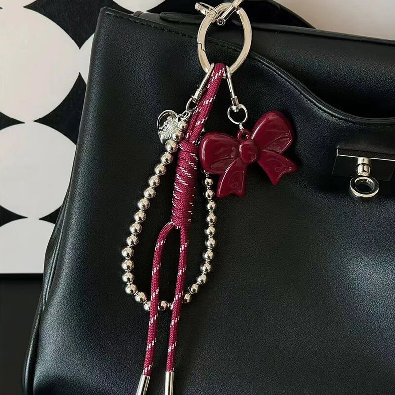 Брелок для сумки Ankela Red Bow, черный, с бусинами