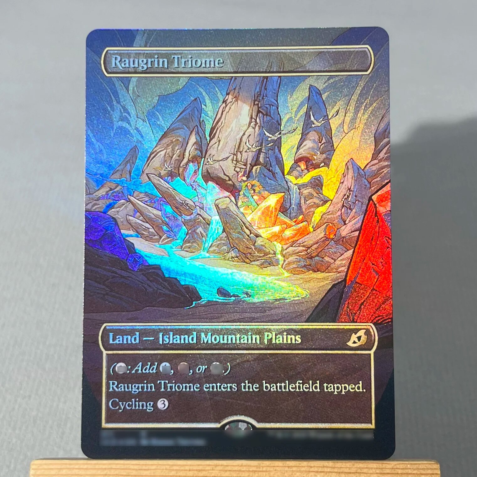 Raugri Triome, Коллекционная карта Magic: The Gathering, Цвет: 311, IKO