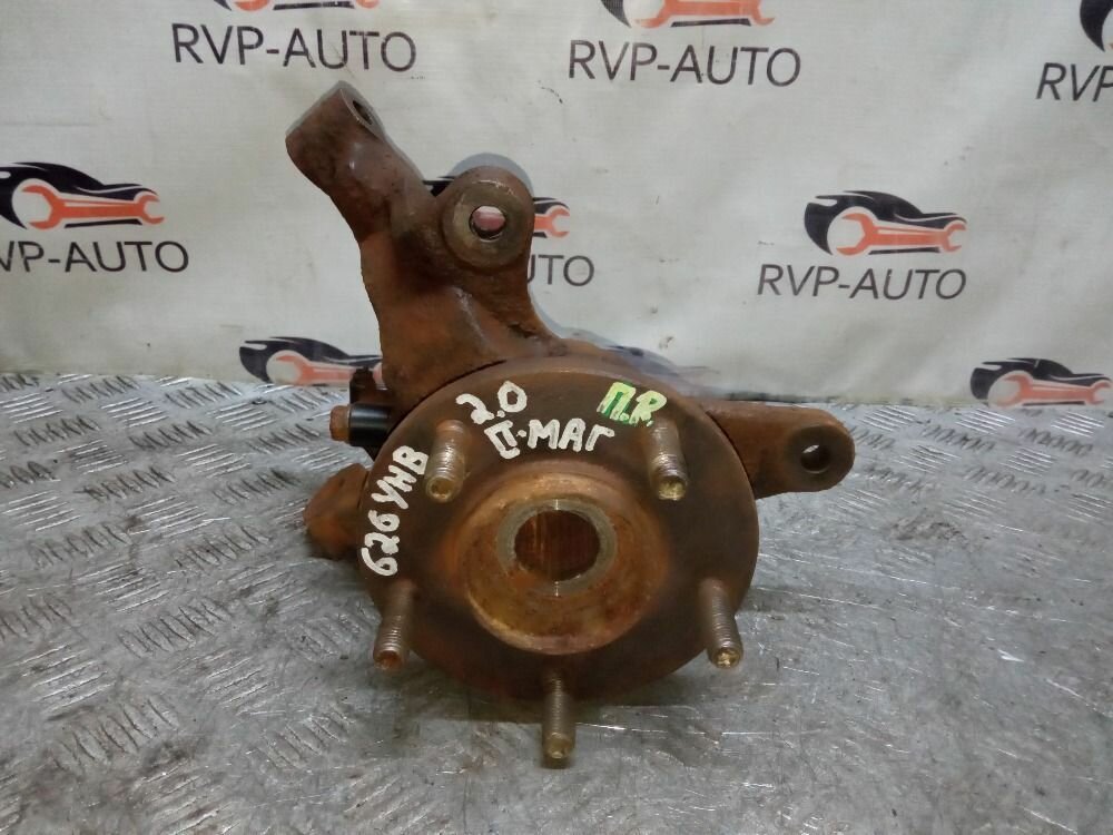 Кулак передний правый Mazda 626 GW 2.0 1997-2002