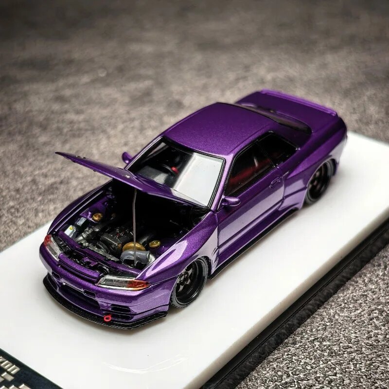Модель автомобиля Nissan Skyline GT-R R32 GA 1:64 a