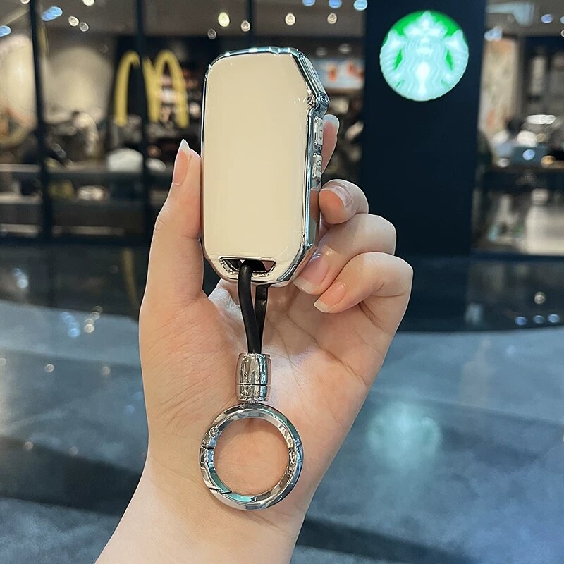 Чехол для ключей Kia белый с серебряной быстрой лентой для моделей KX3, Seltos - одиночный комплект
