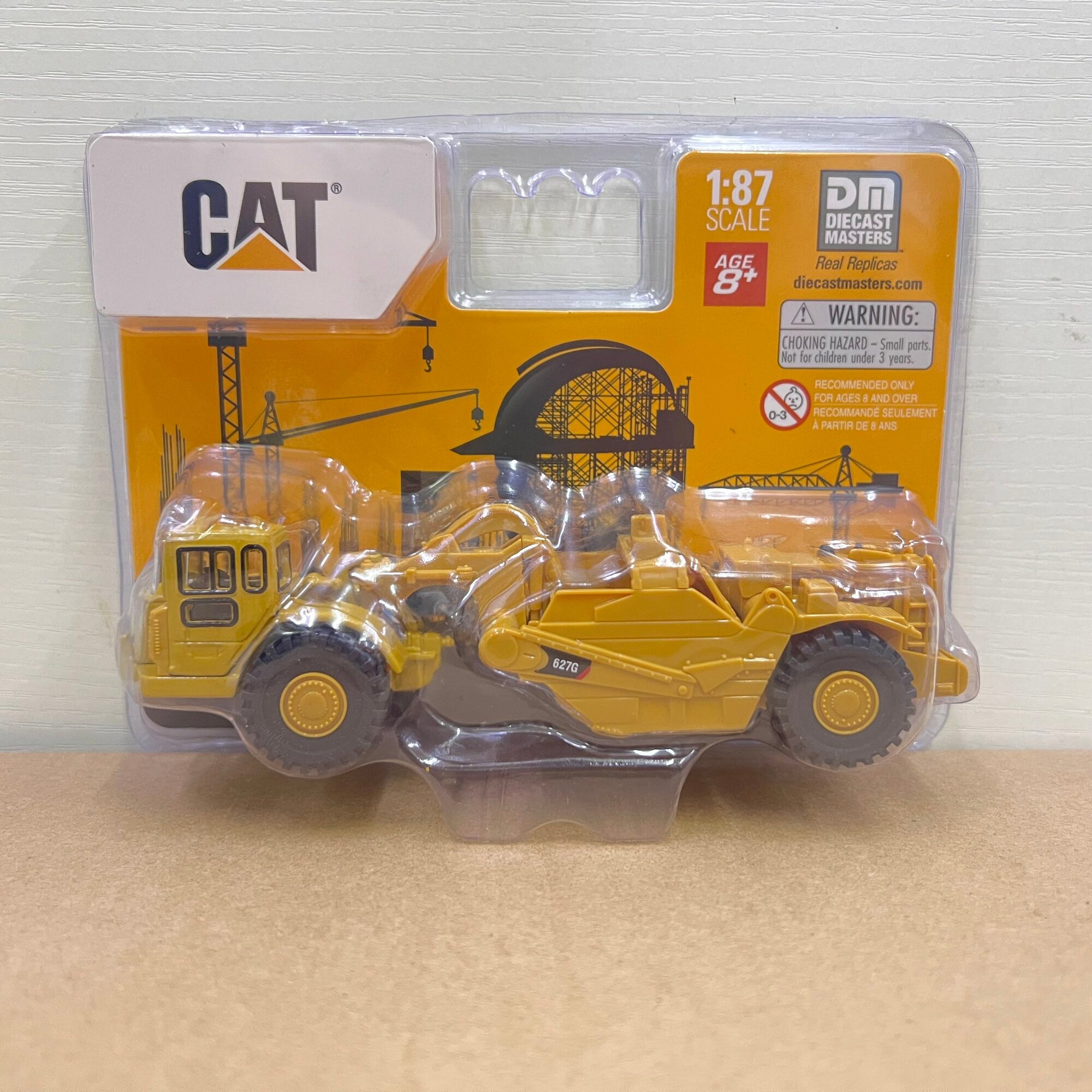 DM 84405 CAT 627G Шнековый скребковый конвейер, масштабная модель (1:87)