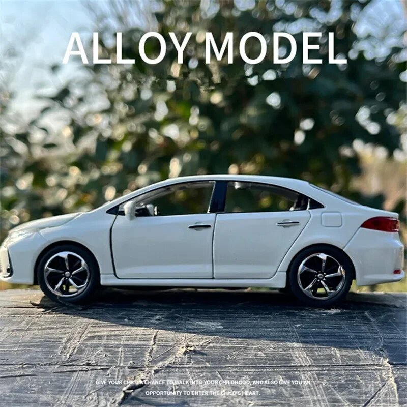 Модель автомобиля MINI AUTO Corolla 1:32 white with box — фото 1