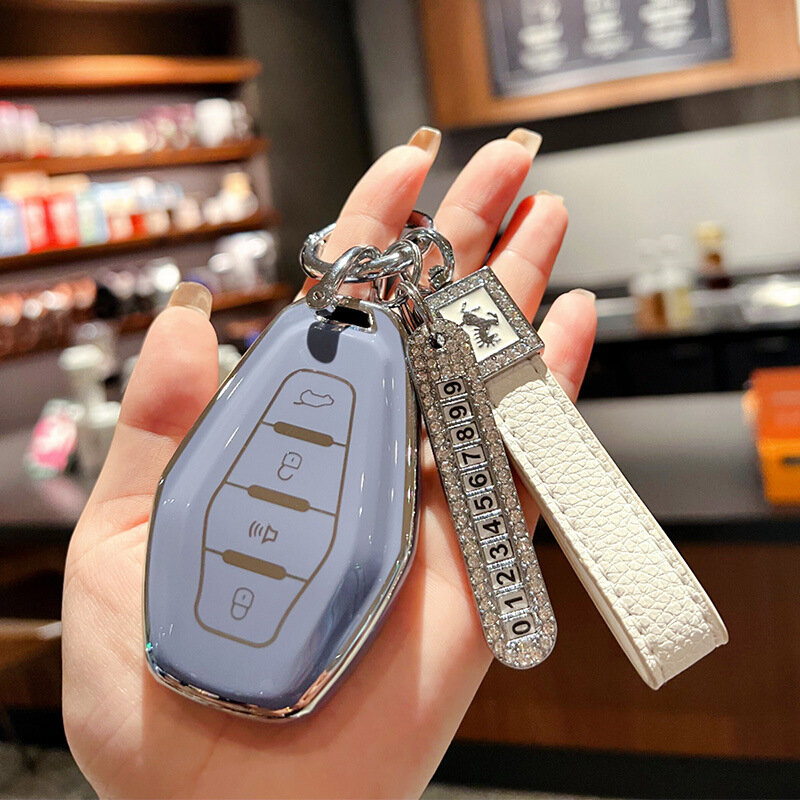 Чехол для ключей Chery JETOUR серый чехол с белым кожаным шнуром и номером под модель X95