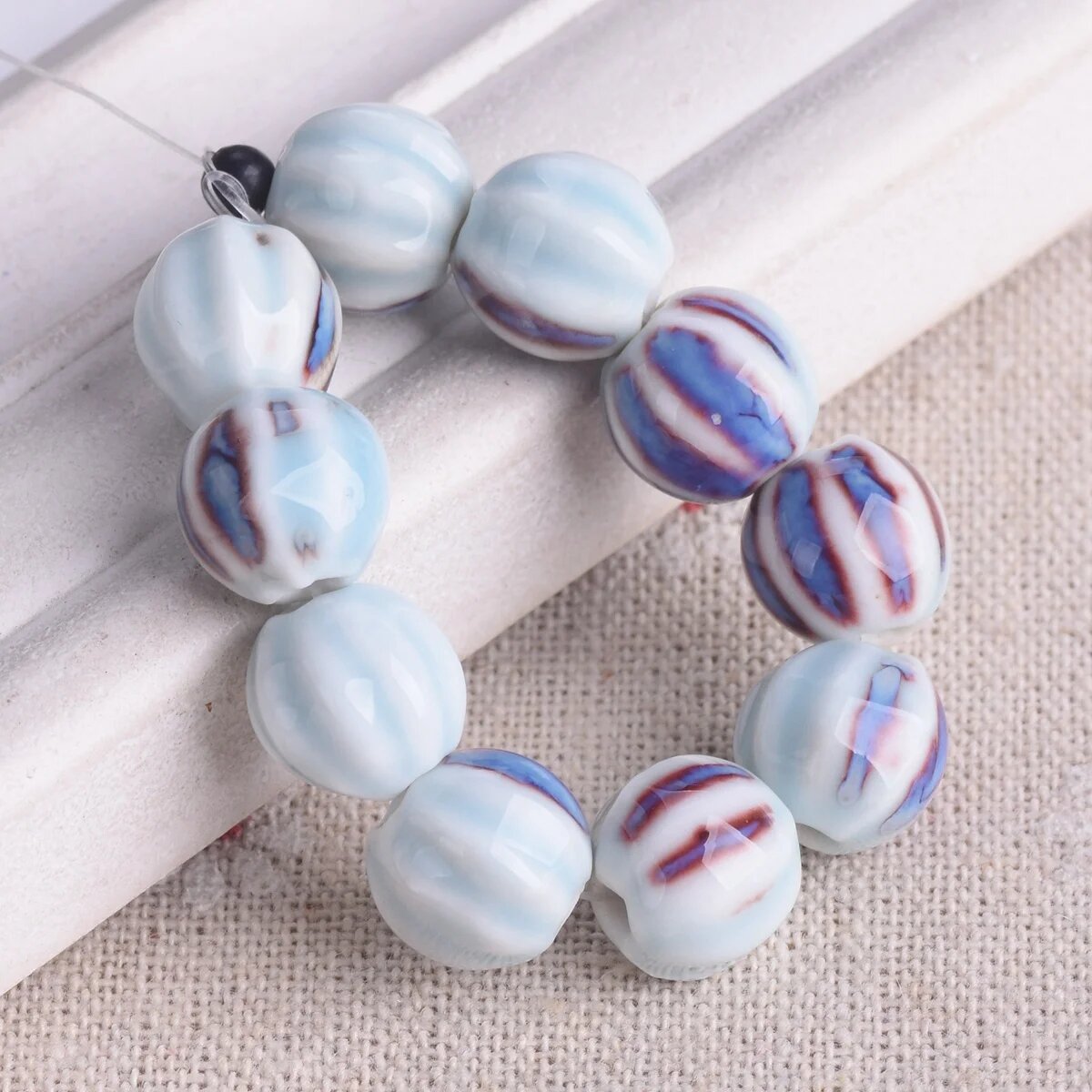 Керамические бусины Dreamzeal круглые тыква 11 мм 10 шт Голубой, Light Blue