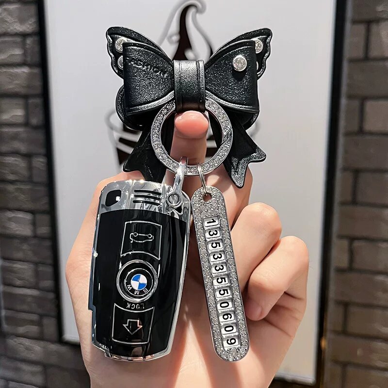 BMW Вставная ключевая оболочка для X1, 3 Series 320i, 5 Series X5, X6, Z4 - Бант черная с номерным знаком