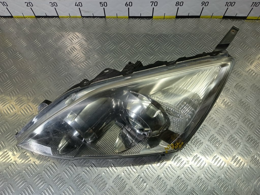 Фара передняя левая Б/У для HONDA CR-V III (2006—2009) 33151SWWE11