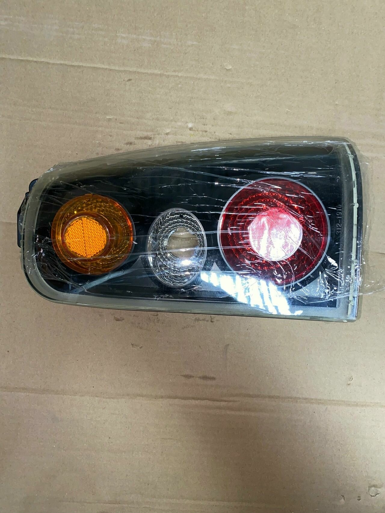 Стоп фара COROLLA AE100 91-97 RH SAT WG черн ST-212-1991BR