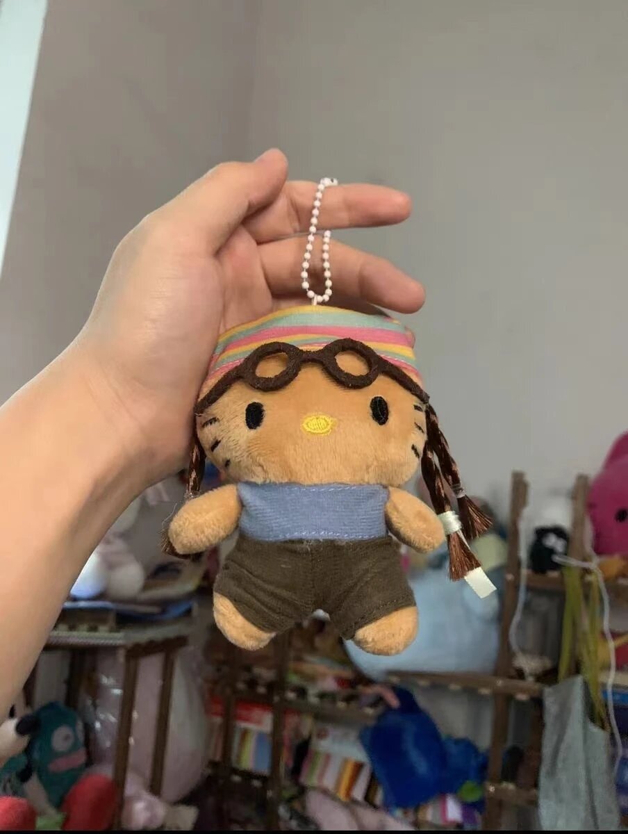 Плюшевый брелок Sanrio Hello Kitty с косичками
